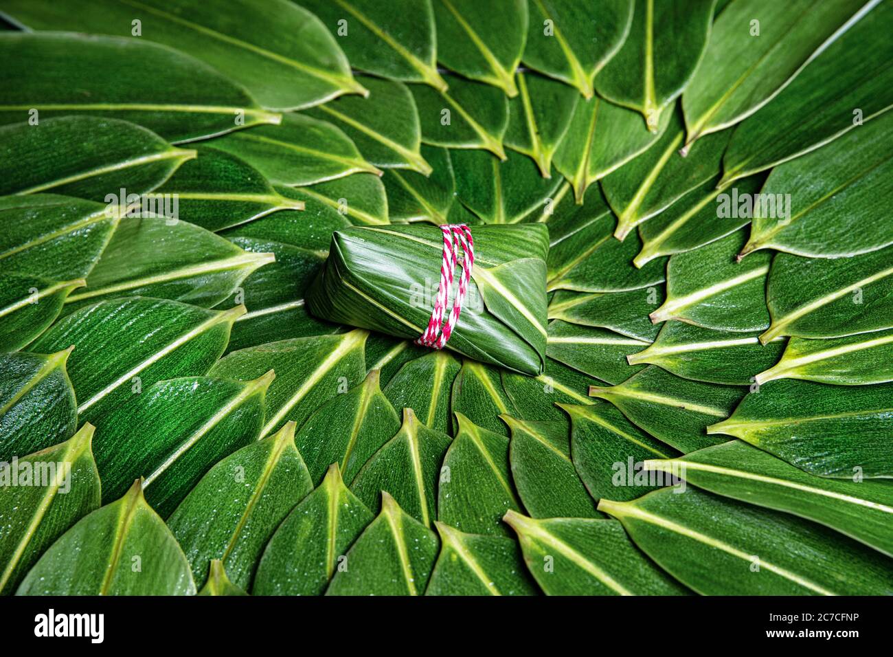 Rice dumplings and leaves Stock Photo - Alamy
