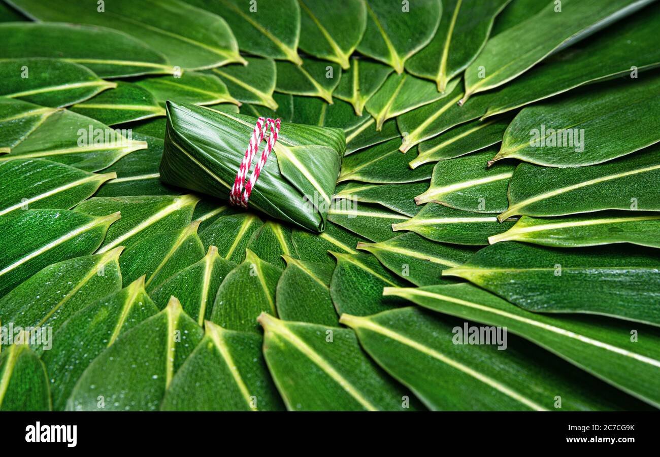 Rice dumplings and leaves Stock Photo - Alamy