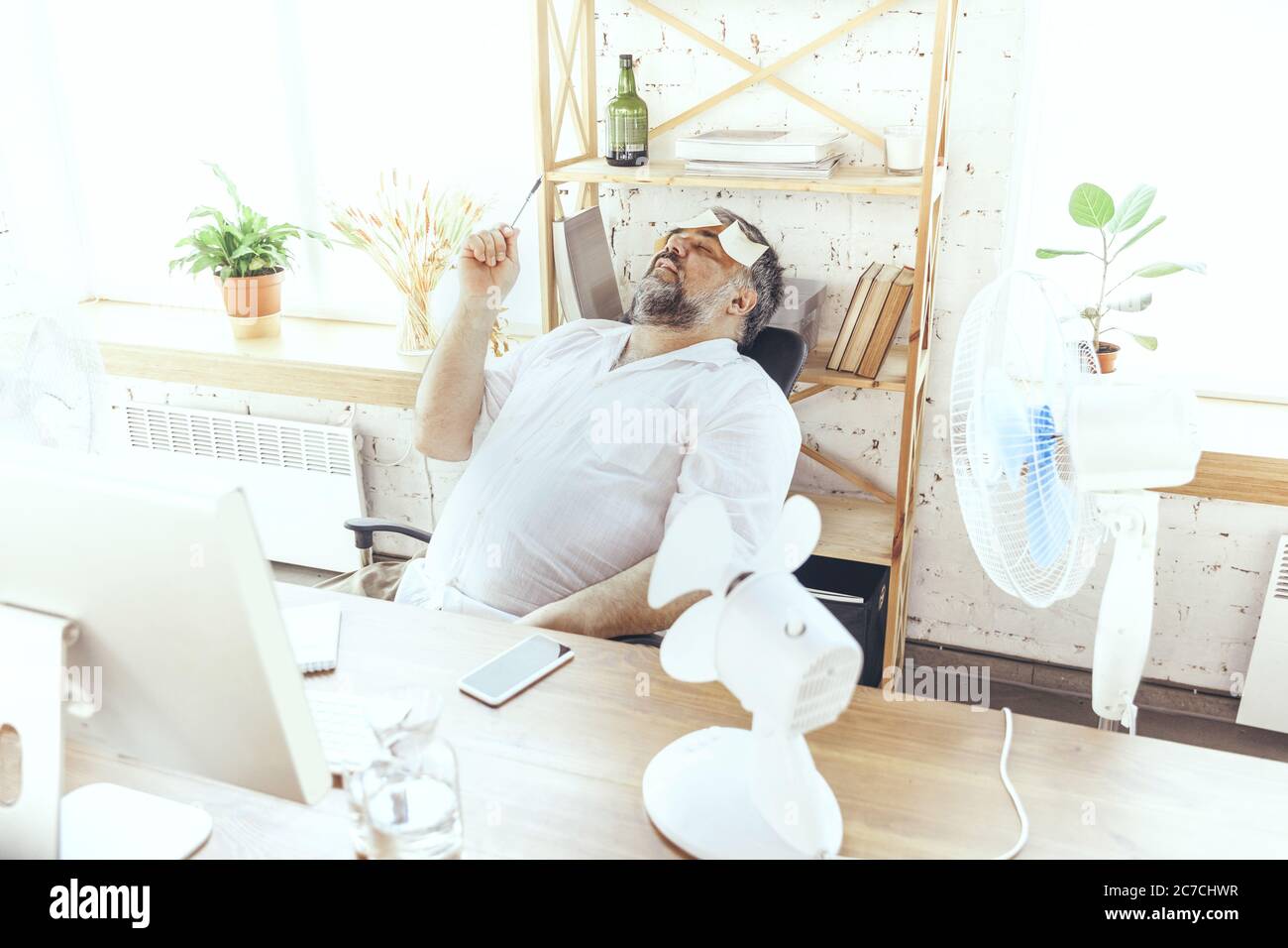 Man feeling hot and uncomfortable hi-res stock photography and images ...
