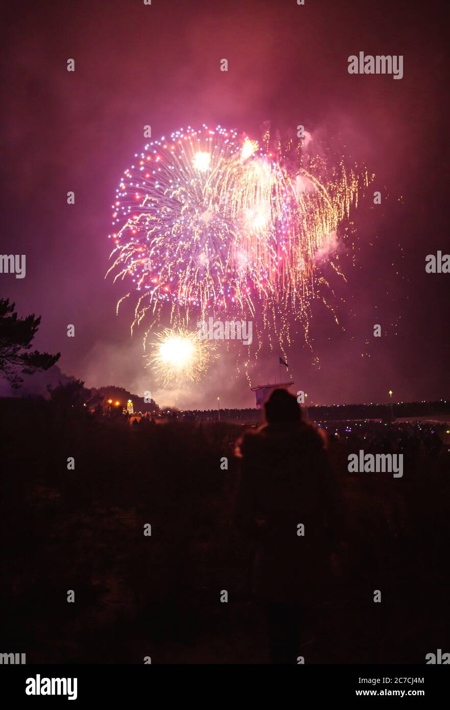 Low angle shot of beautiful fireworks for a big celebration at night ...