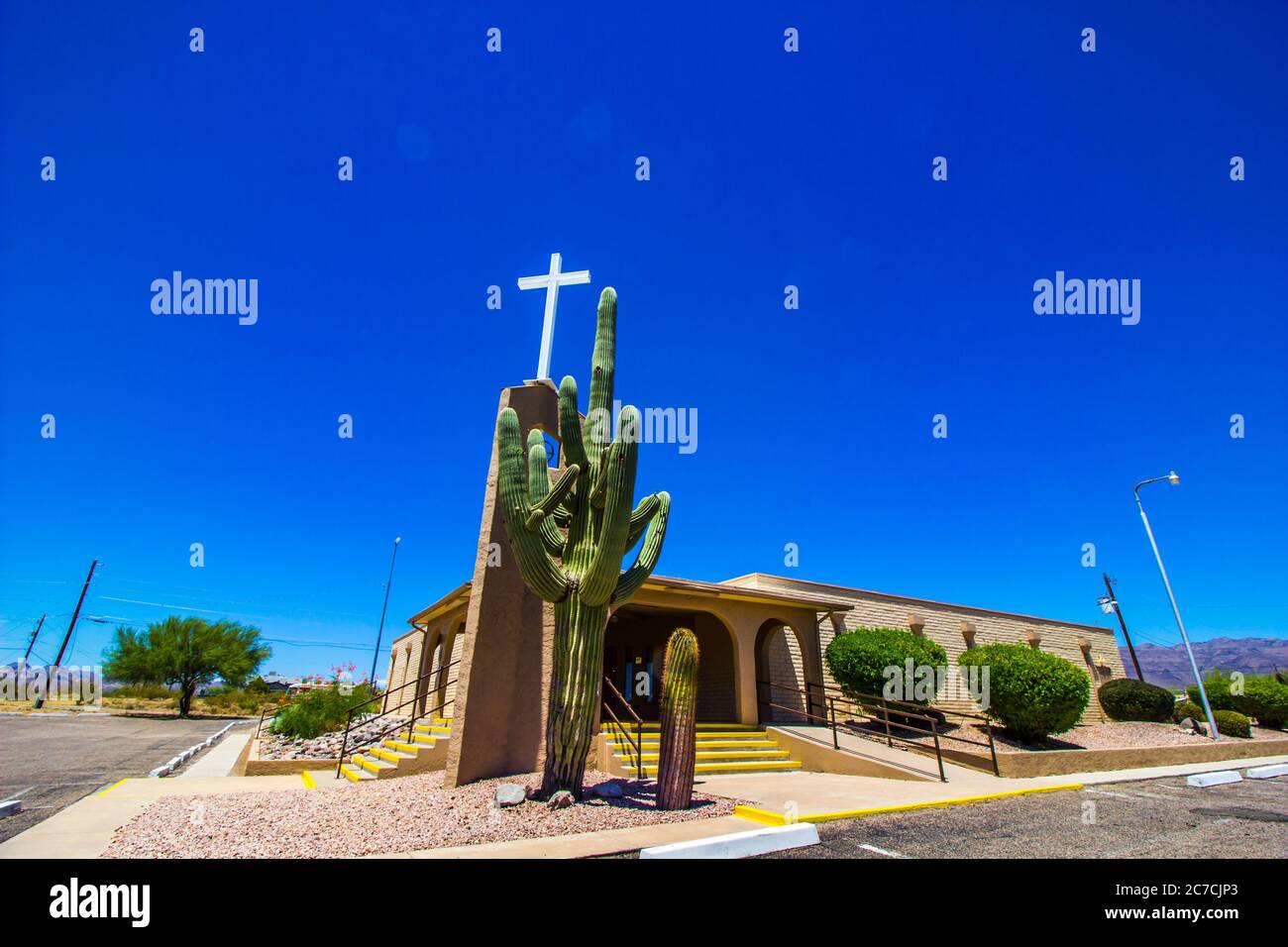 Front Of Desert Church With Belfry & Large Saguaro Cactus Stock Photo ...