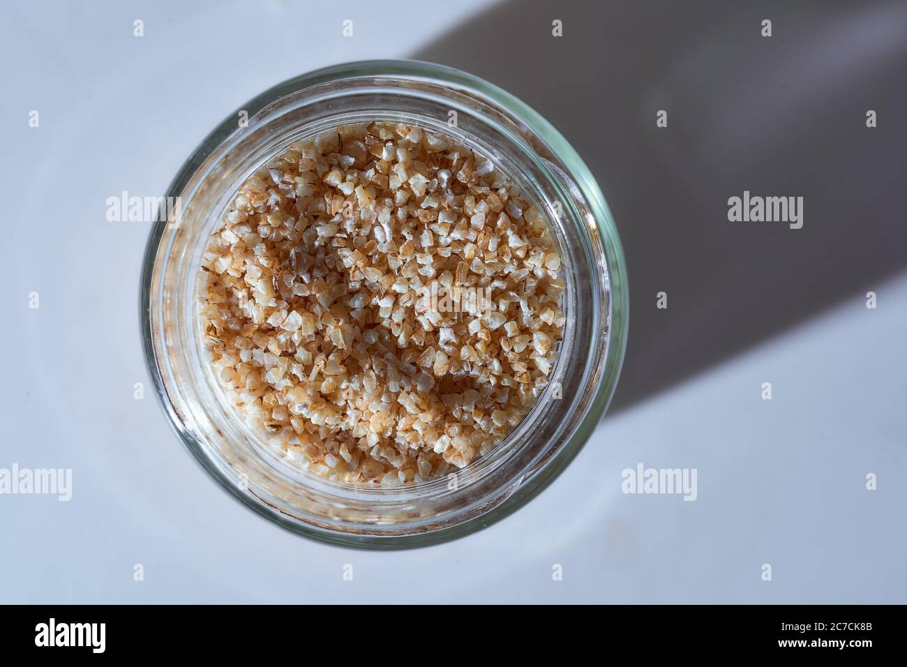 Corn grits in a glass jar. Top view. With copy space Stock Photo - Alamy