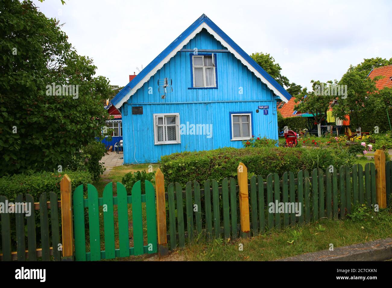 Colorful rural house in Lithuania Stock Photo - Alamy