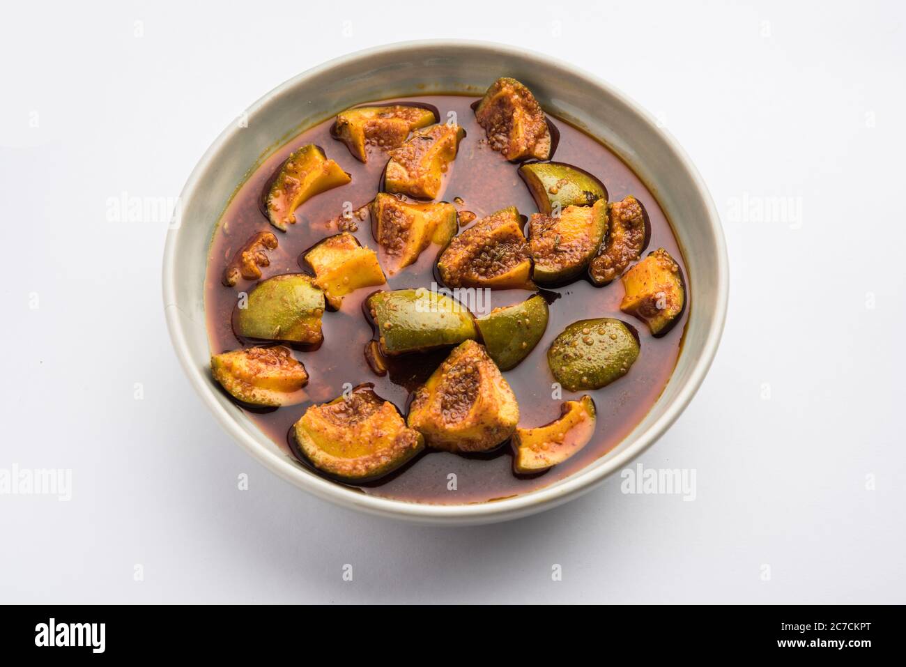 Homemade Mango Pickle or Aam ka Achar in a bowl, selective focus Stock ...