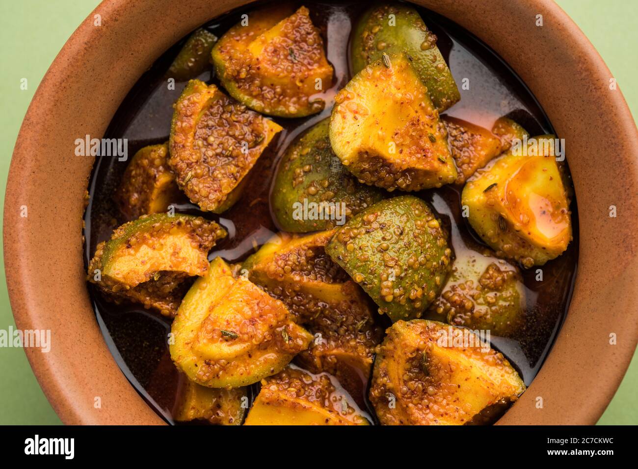 Homemade Mango Pickle or Aam ka Achar in a bowl, selective focus Stock ...