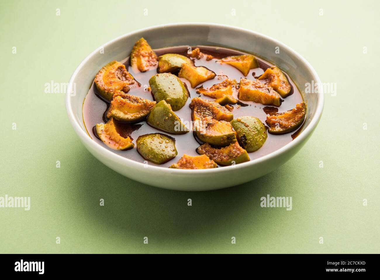 Homemade Mango Pickle or Aam ka Achar in a bowl, selective focus Stock ...