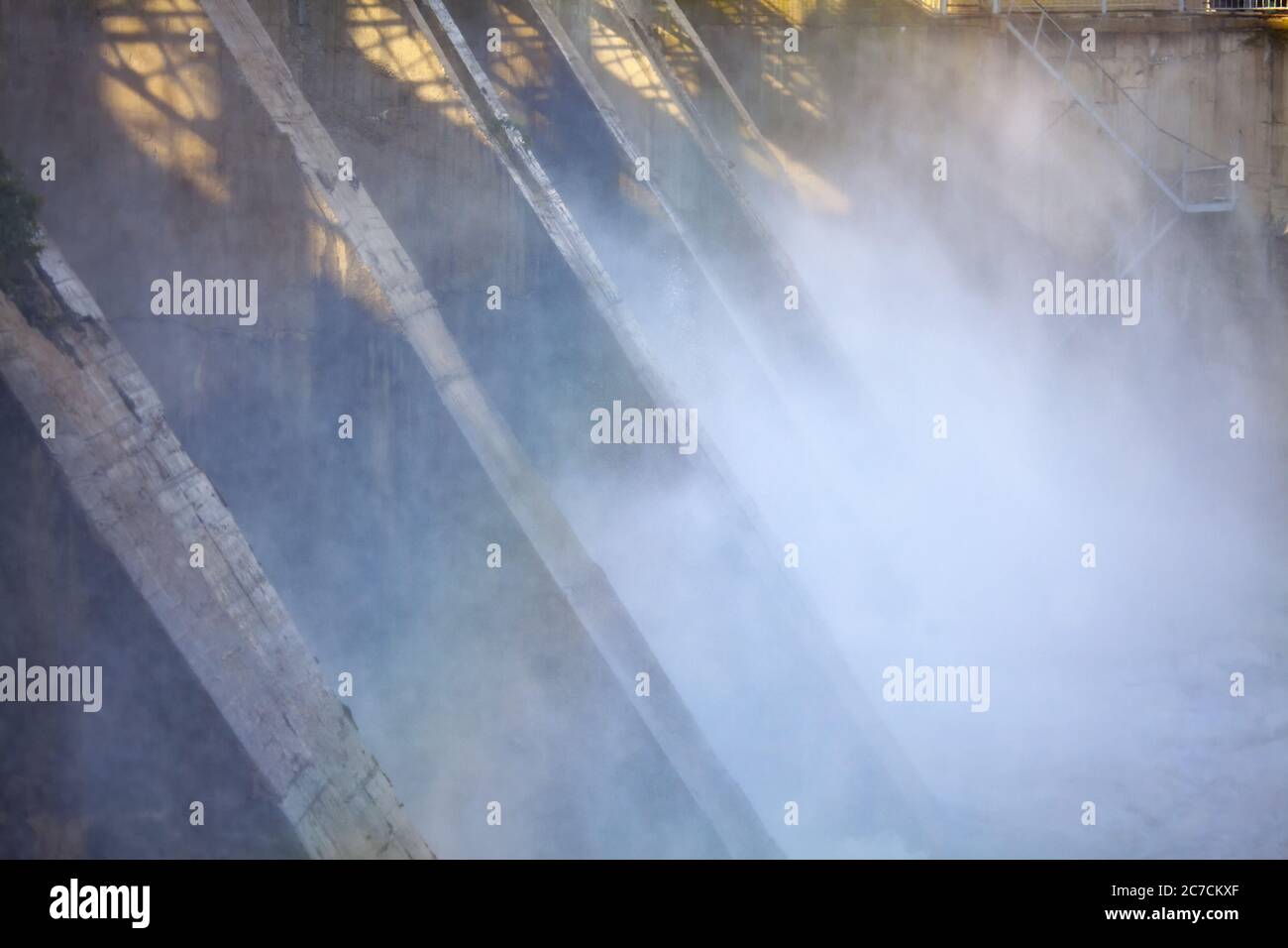 Splashing water of open floodgates . Working hydro power plants Stock ...
