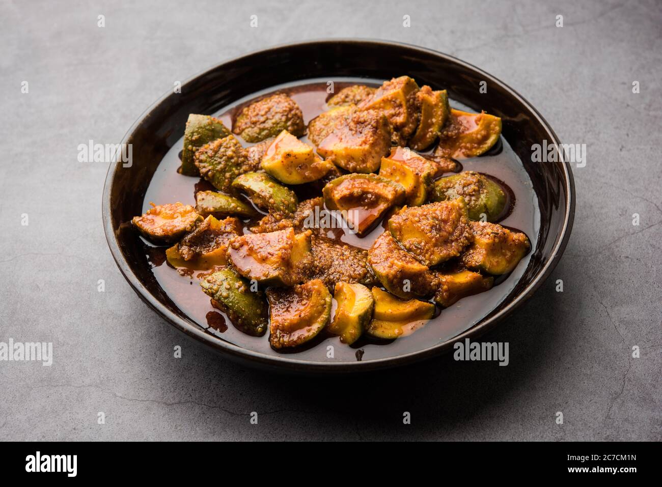 Homemade Mango Pickle or Aam ka Achar in a bowl, selective focus Stock ...