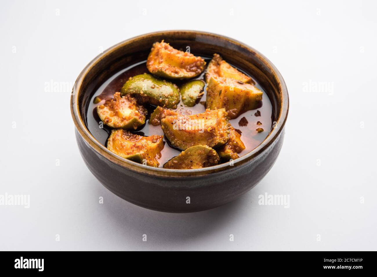 Homemade Mango Pickle or Aam ka Achar in a bowl, selective focus Stock ...