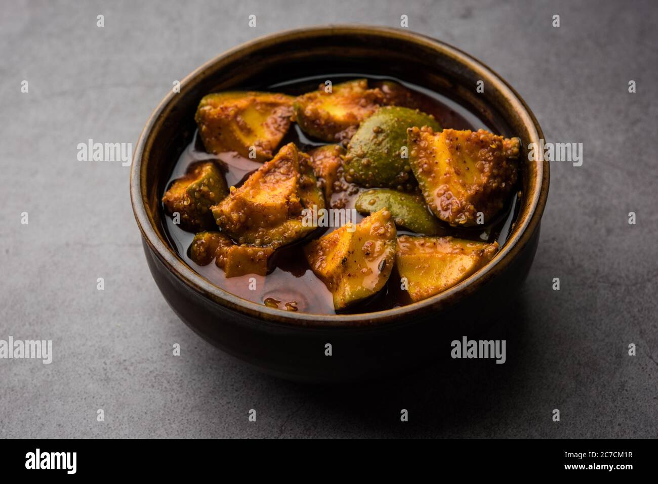 Homemade Mango Pickle or Aam ka Achar in a bowl, selective focus Stock ...