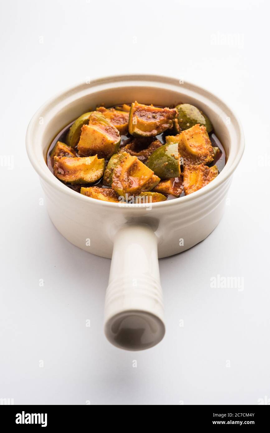 Homemade Mango Pickle or Aam ka Achar in a bowl, selective focus Stock ...