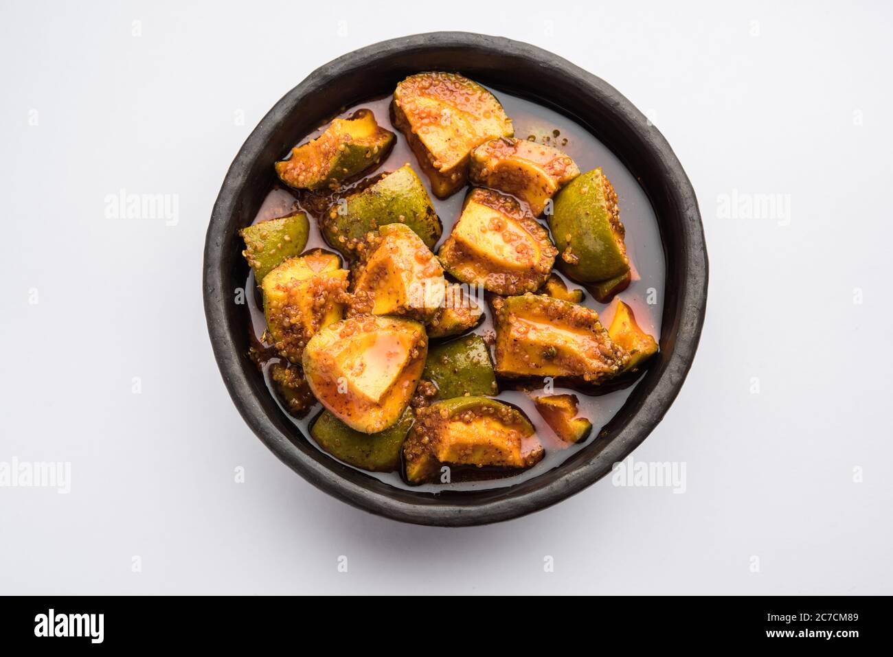 Homemade Mango Pickle or Aam ka Achar in a bowl, selective focus Stock ...