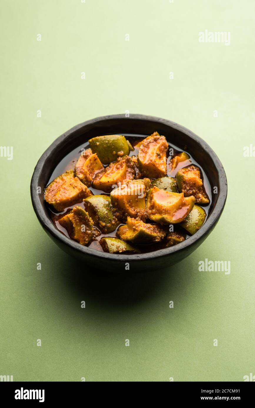 Homemade Mango Pickle or Aam ka Achar in a bowl, selective focus Stock ...