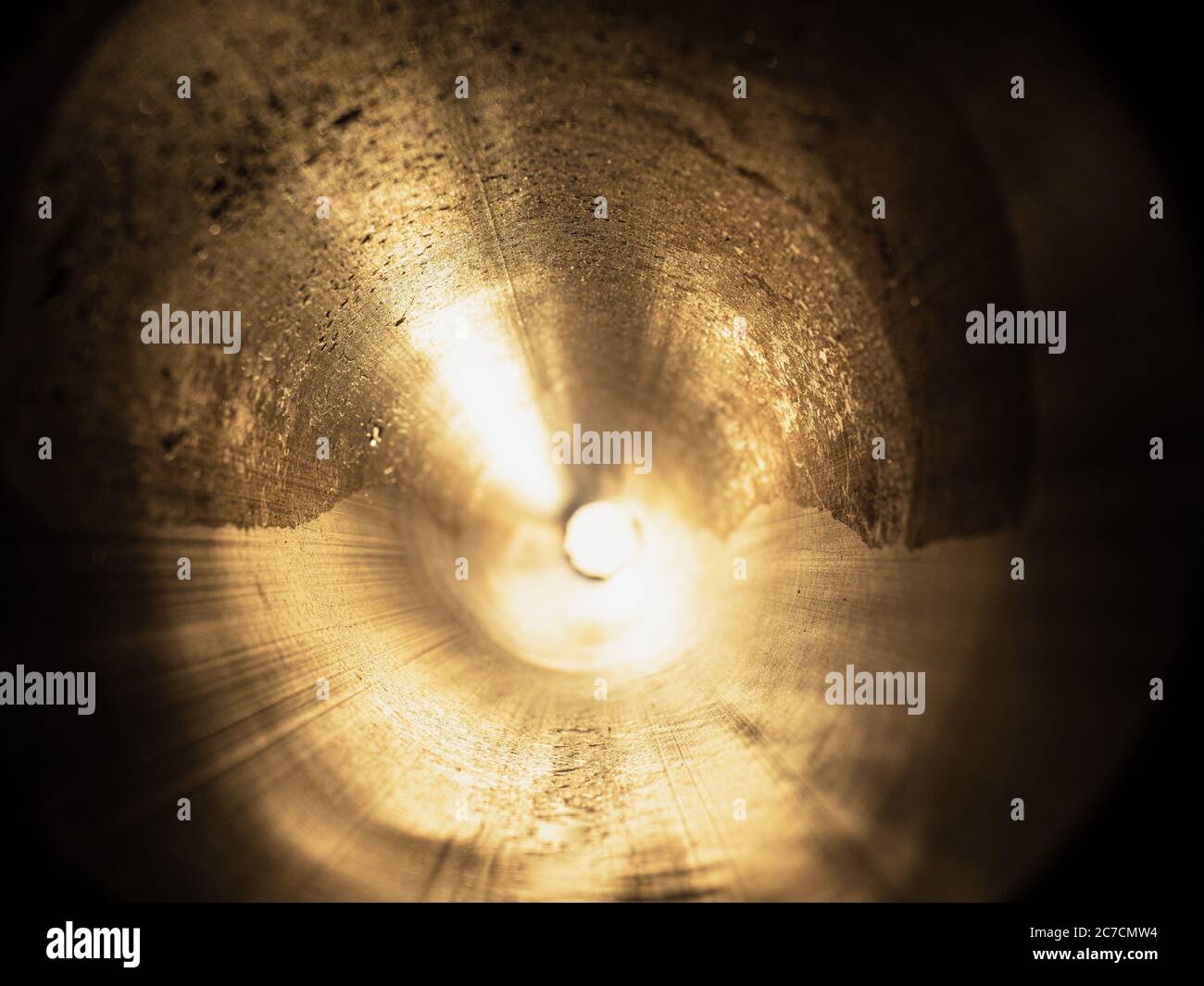 Long steel pipe with sunlight through. Abstract Rounded View Through A ...