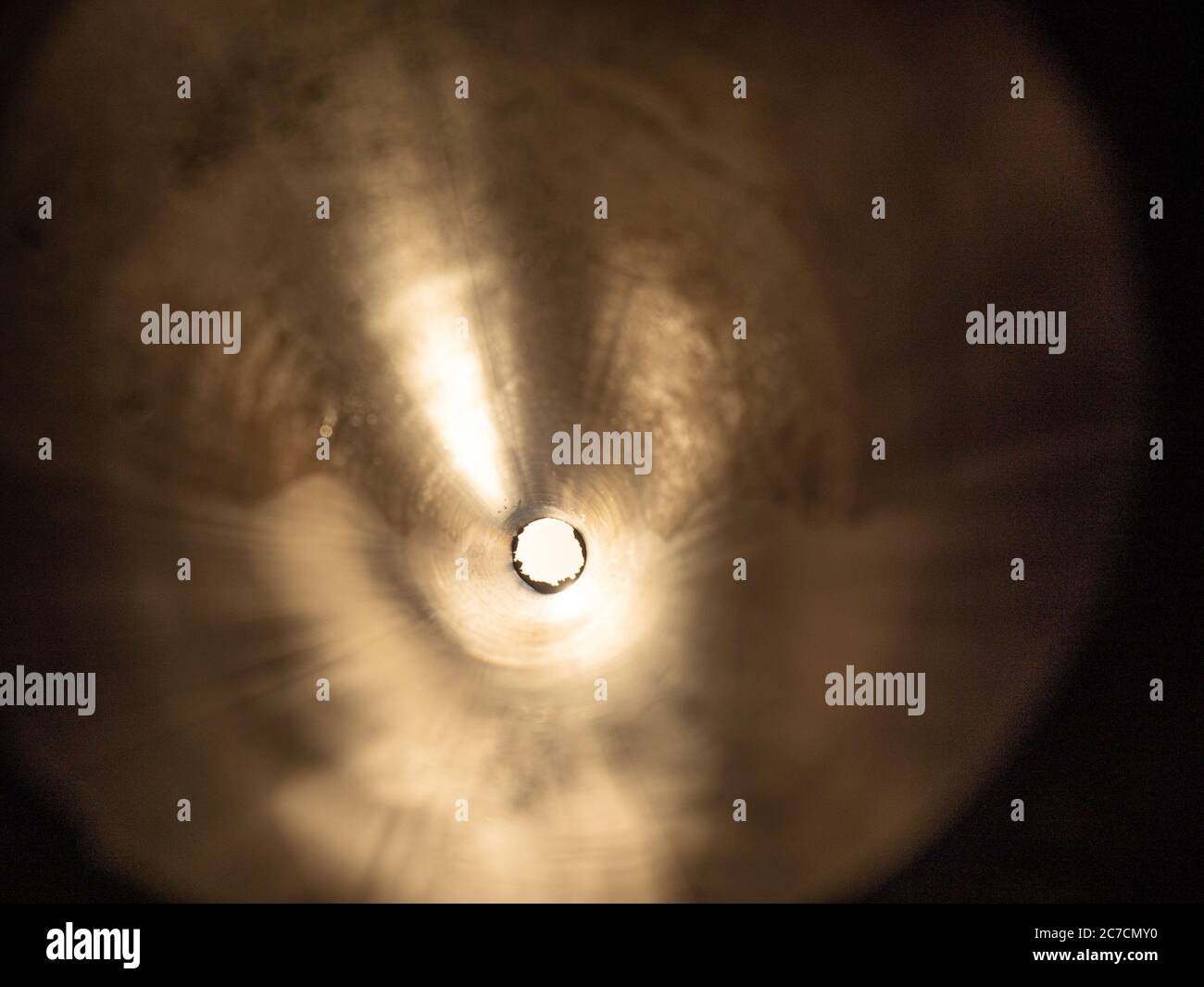 Rounded View Through long silver metal tube With The Lightning Stock ...