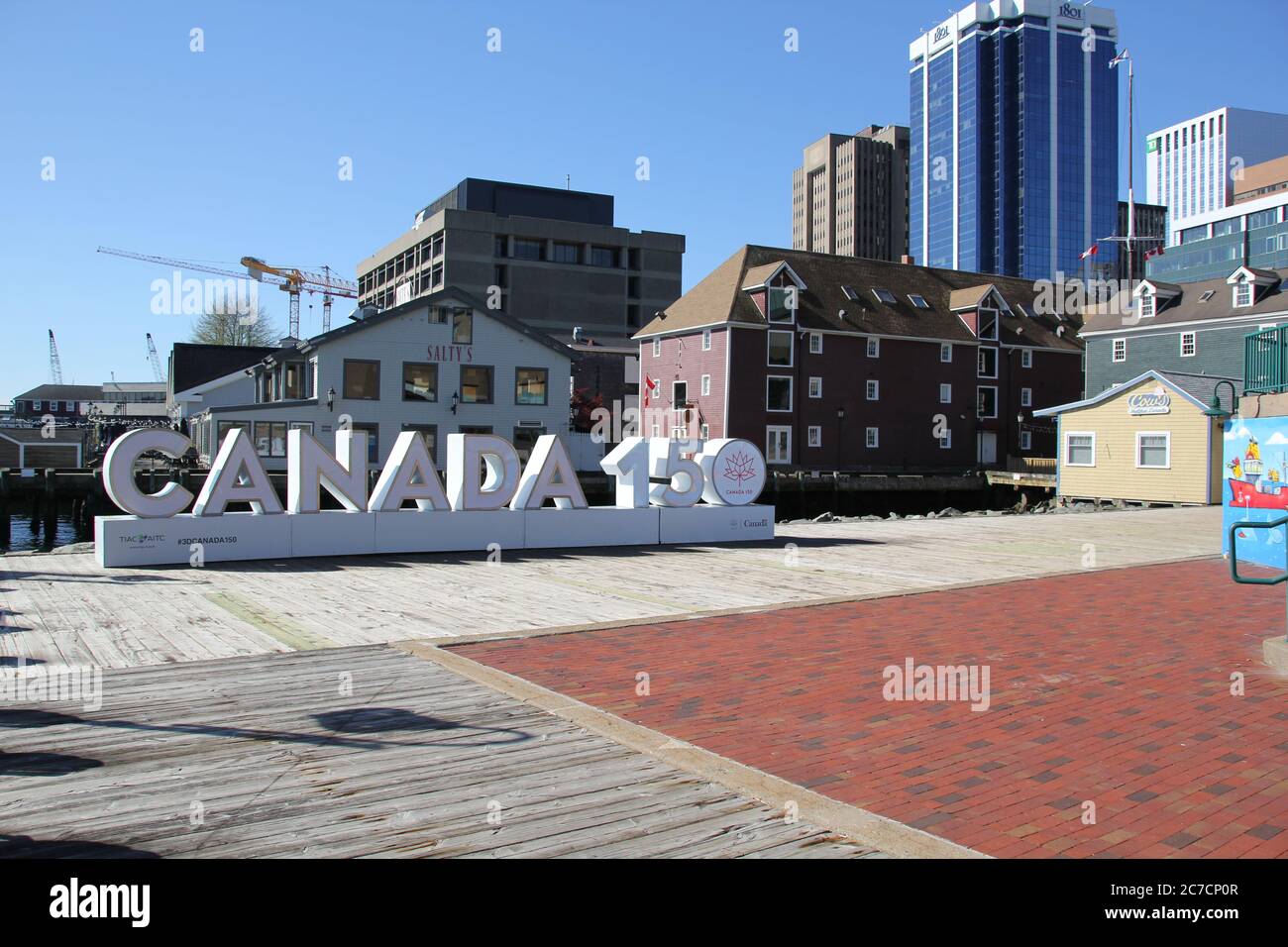 Halifax Nova Scotia waterfront spring Canada 150 sign Stock Photo - Alamy