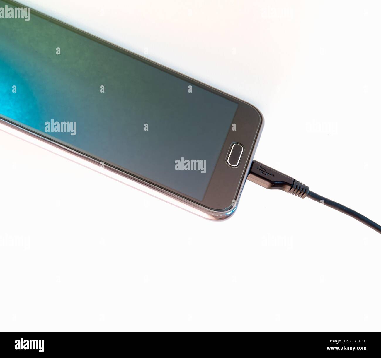 Charger cable connect to smart phone Stock Photo - Alamy