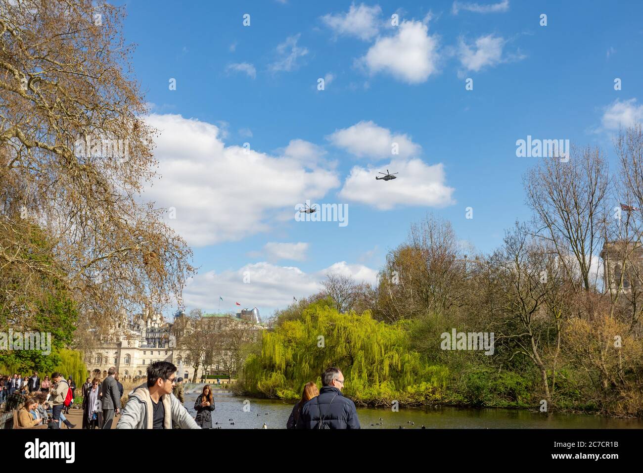 Military Helicopters flying over the city of London and St James's Park ...