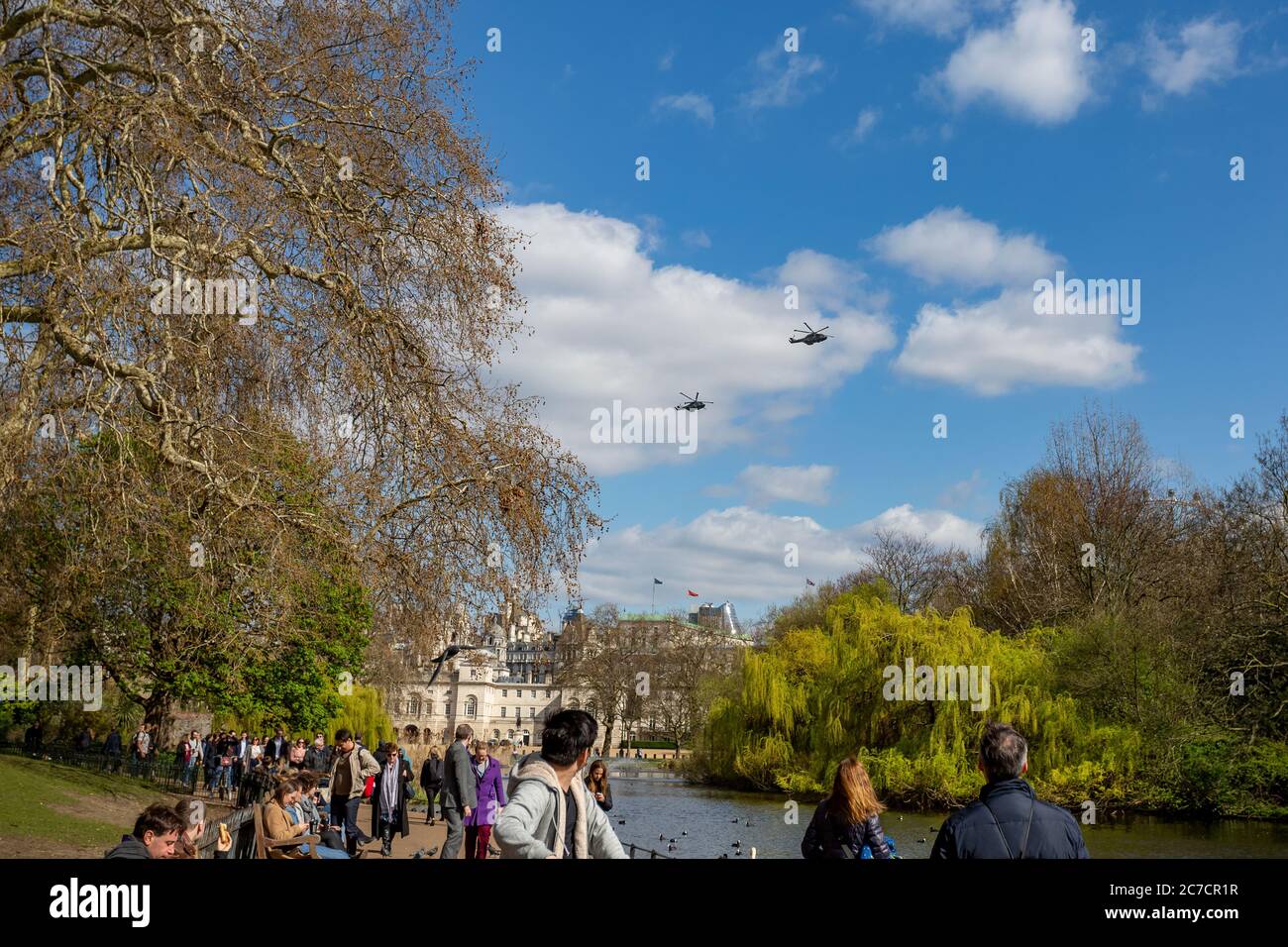 Military Helicopters flying over the city of London and St James's Park ...