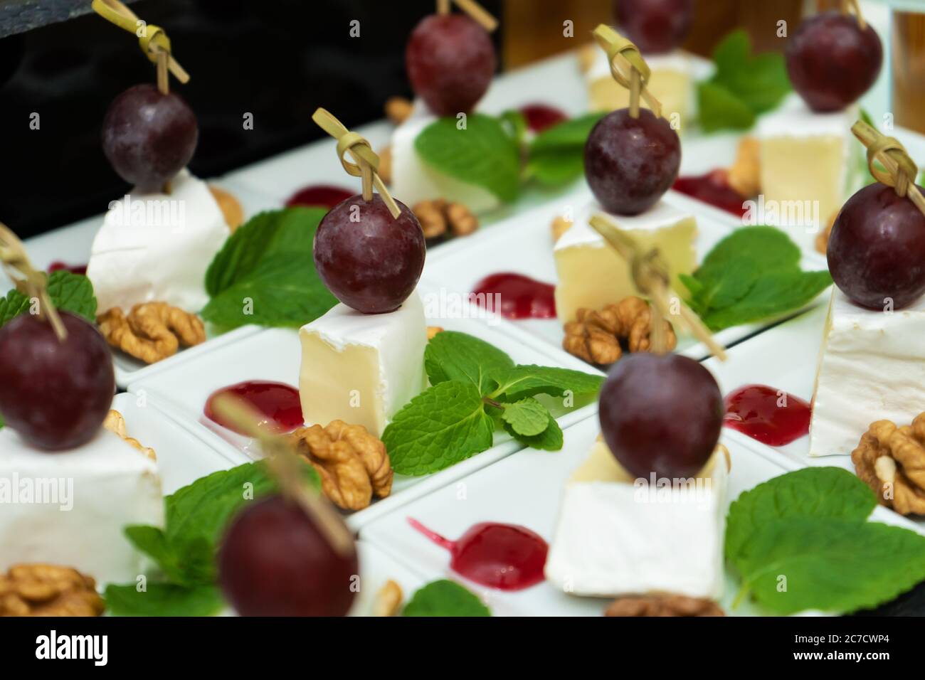 Festive buffet table with many snacks and appetizers Stock Photo - Alamy