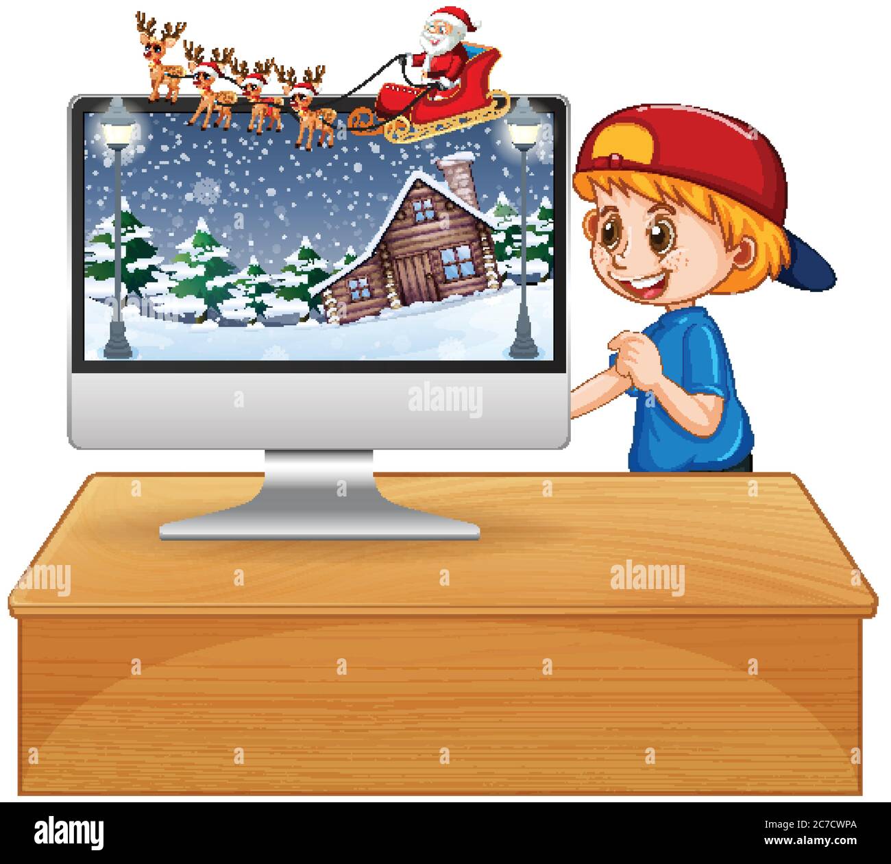 Boy next to computer on the table with xmas theme desktop background ...