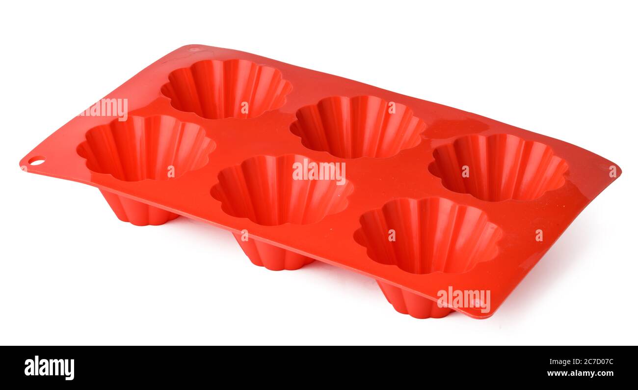 Silicone form for cupcake baking on white background Stock Photo - Alamy
