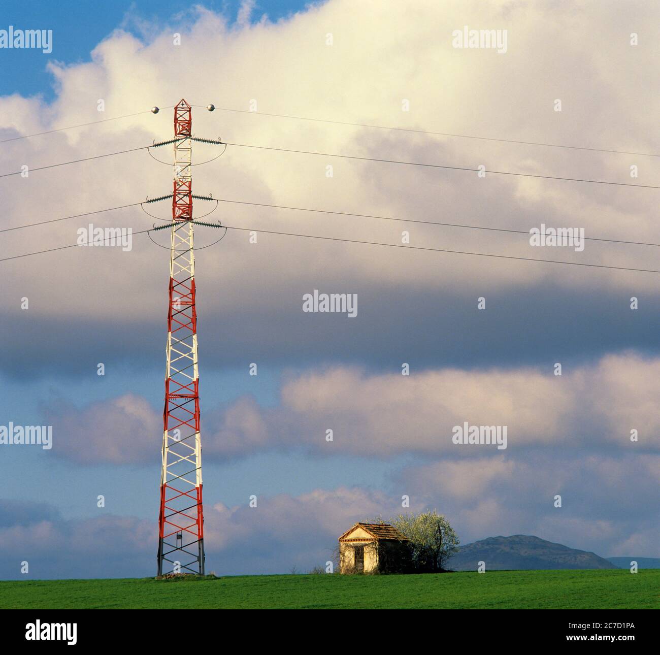 Hut in a field near an electric pylon hi-res stock photography and ...