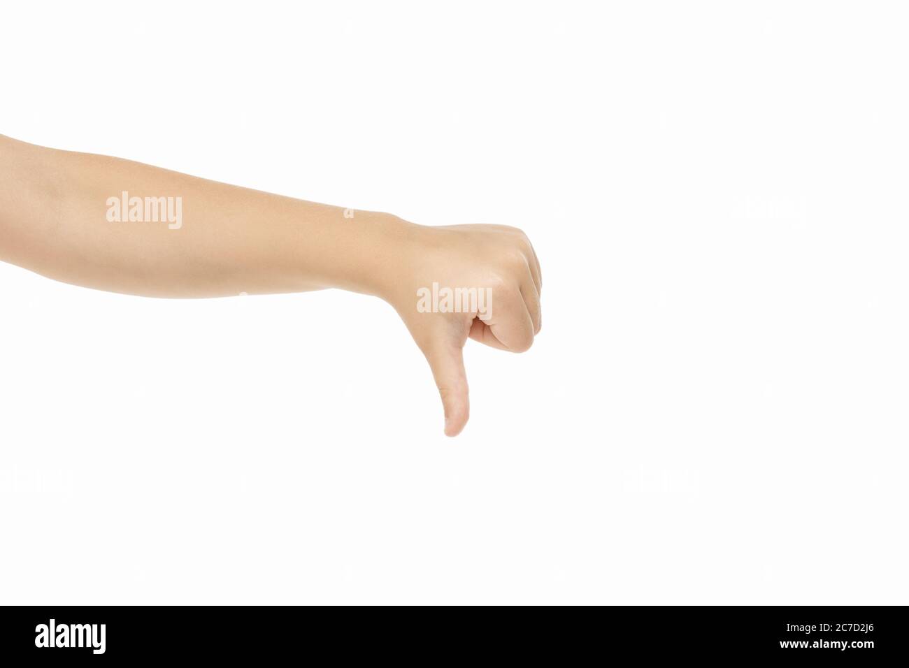 Thumb down. Children's hand, palm gesturing isolated on white studio ...