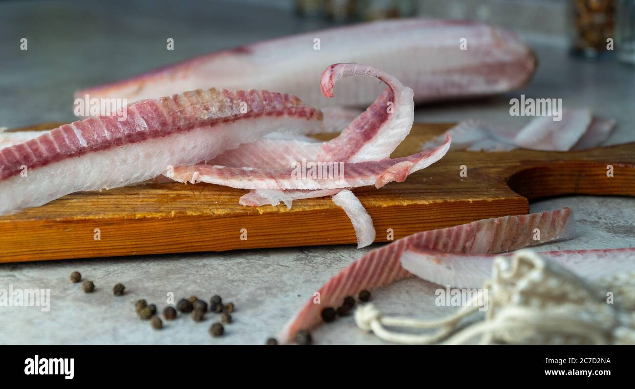 fresh frozen fish cut into thin slices. national dish of raw frozen ...