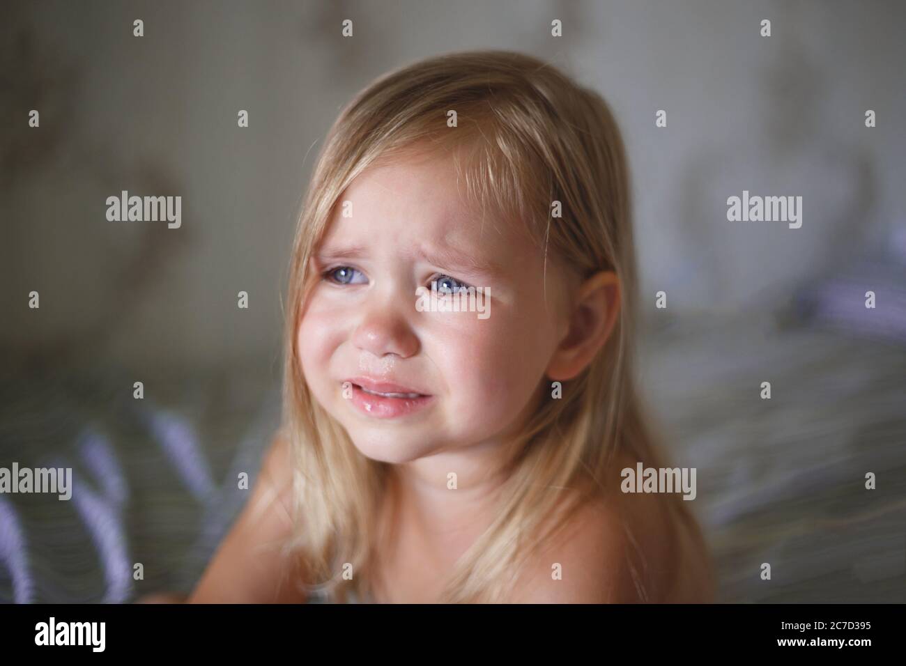portrait of a beautiful little crying girl Stock Photo - Alamy