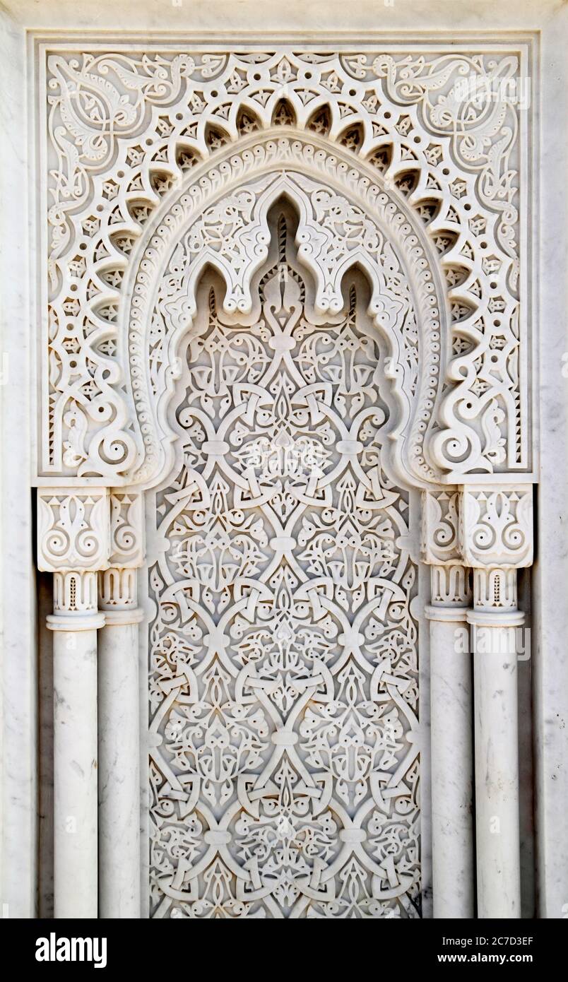 Rabat, Morocco. An arabesque arch and intricately sculpted marble ...