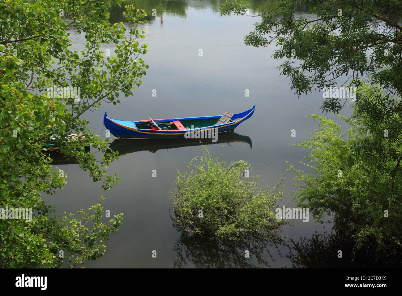 Typical fishing boat on the River Tagus in the picturesque town of ...