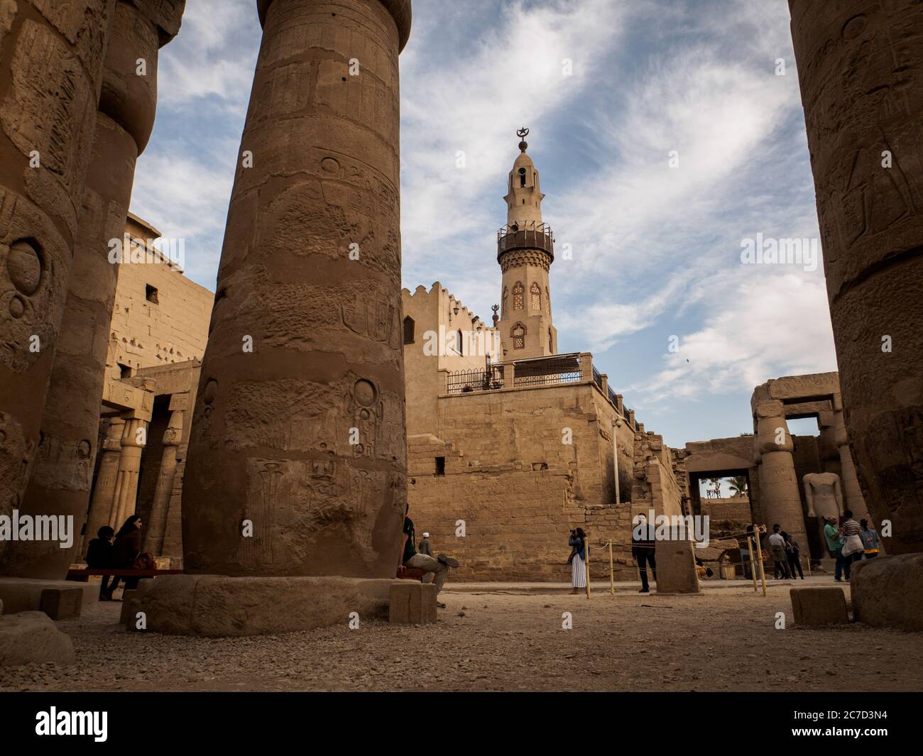 the interior hall of luxor temple with columns and a mosque Stock Photo ...