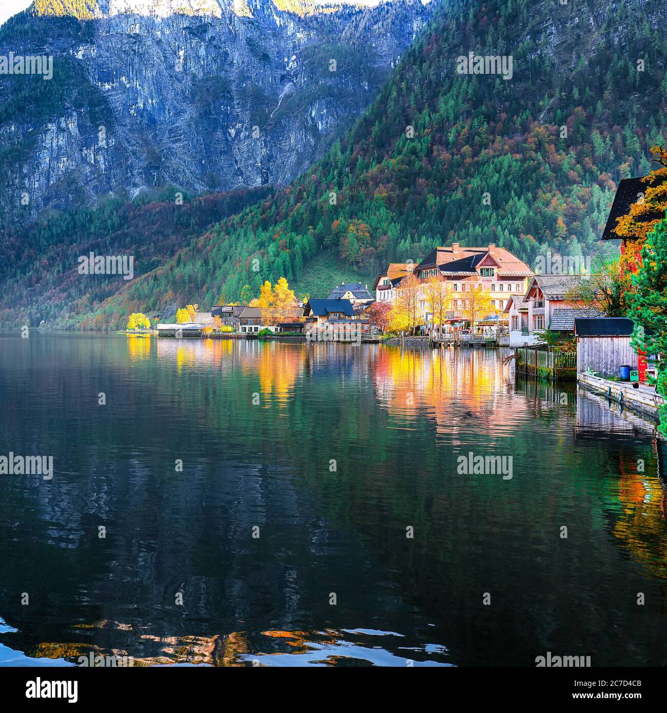 Scenic view of famous Hallstatt mountain village with Hallstatter lake ...