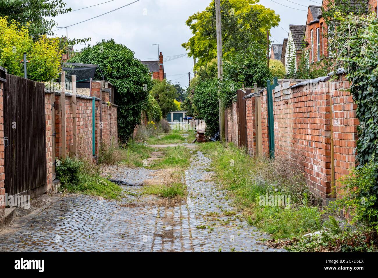 Alleyway between houses in residential hi-res stock photography and ...