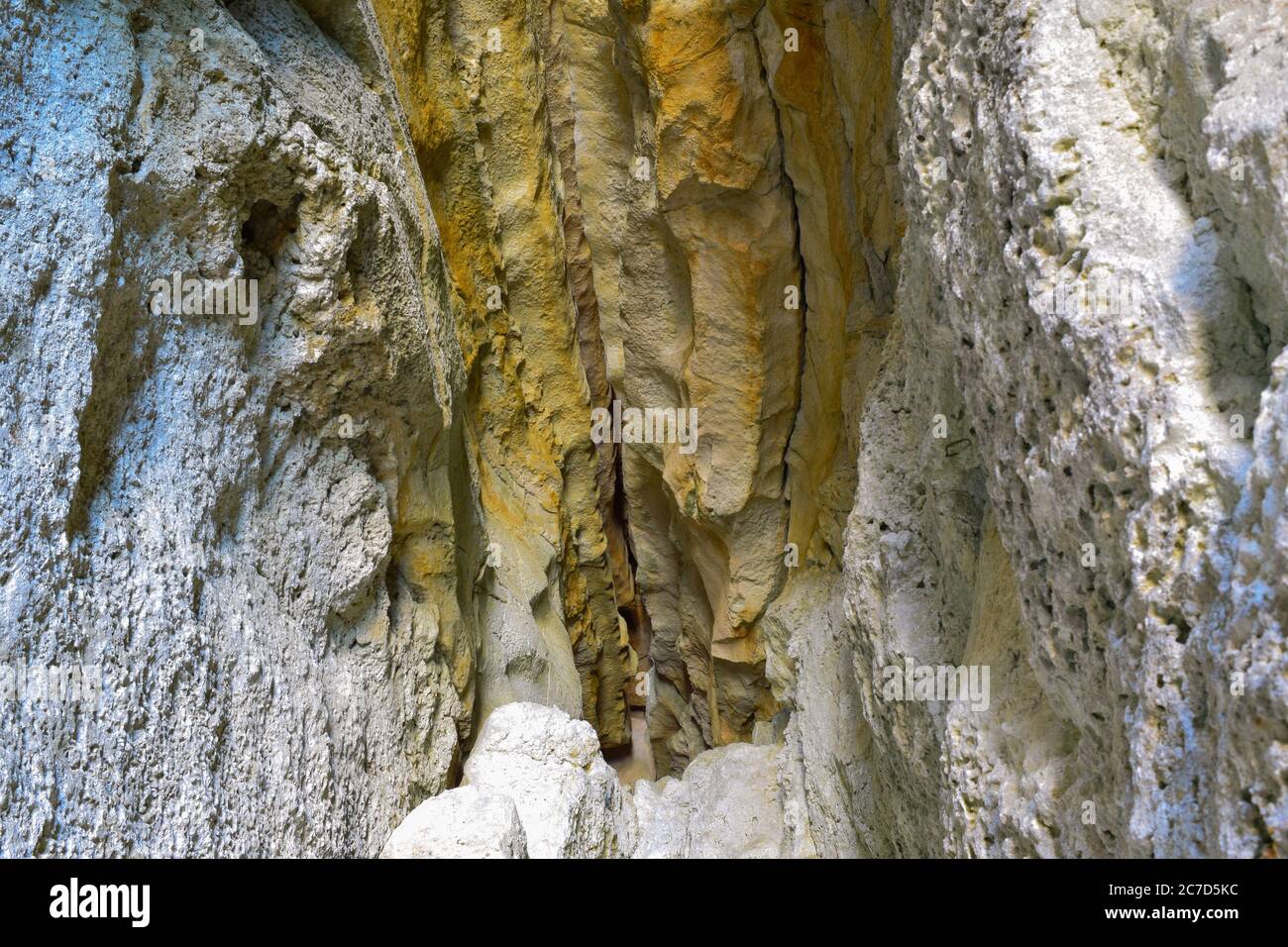 Beautiful shot of a crack in a rocky cave at the sea Stock Photo - Alamy