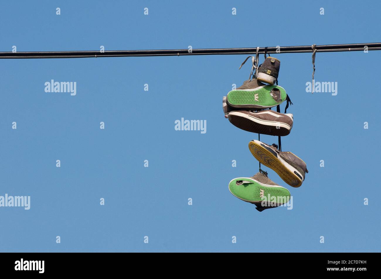 Dangling shoes hi-res stock photography and images - Alamy