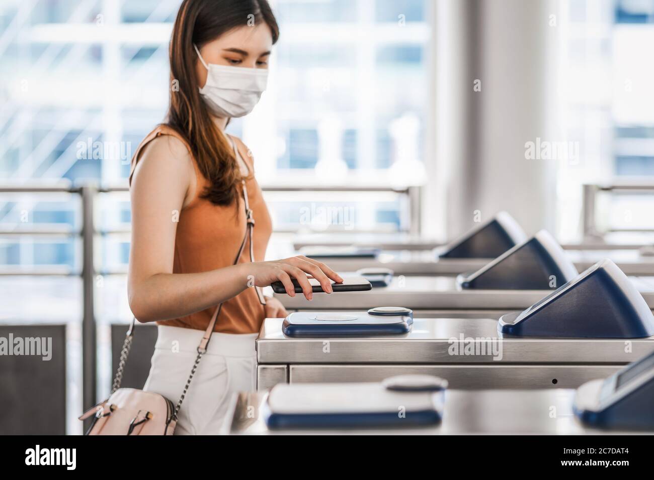 Closeup hand using smart mobile phone of Young Asian woman passenger ...