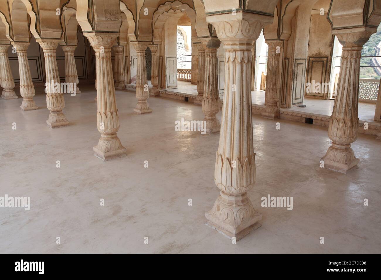 horizontal shot of stone columns in a building in India during daytime ...
