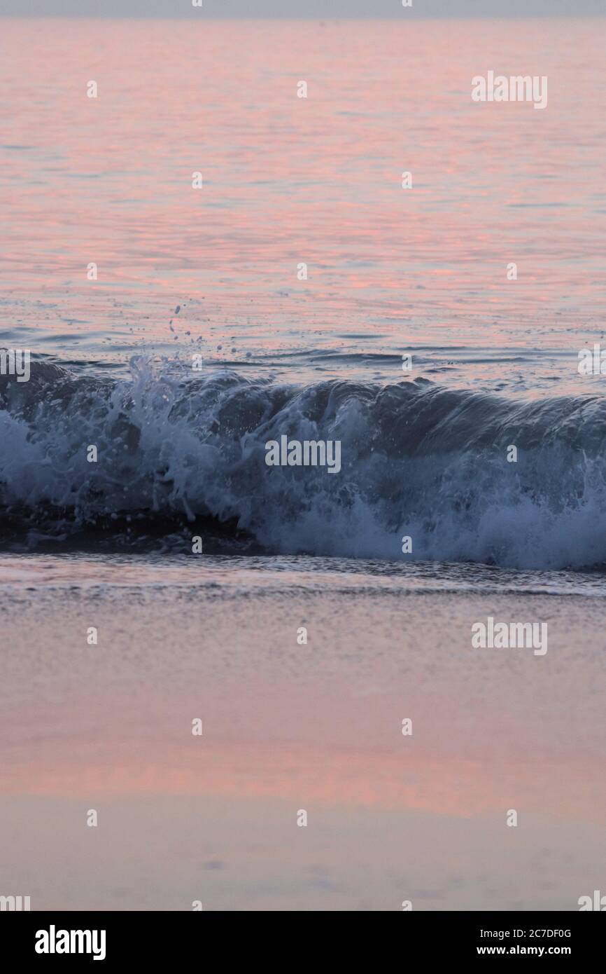Beautiful scenery of the crazy sea waves and the empty beach during ...