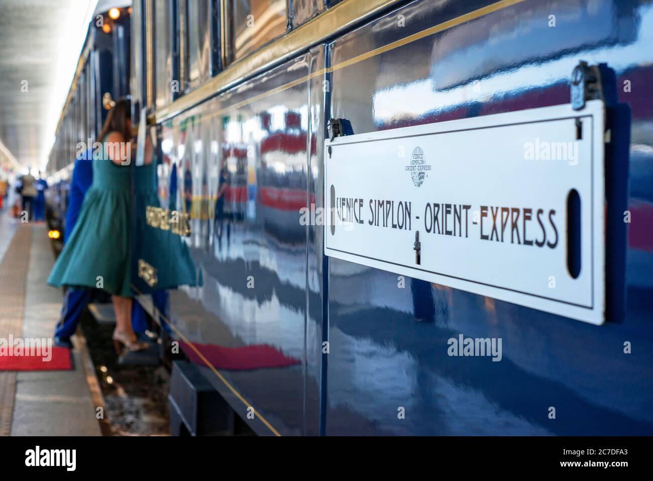 Passengers of Belmond Venice Simplon Orient Express luxury train stoped at Venezia Santa Lucia ...