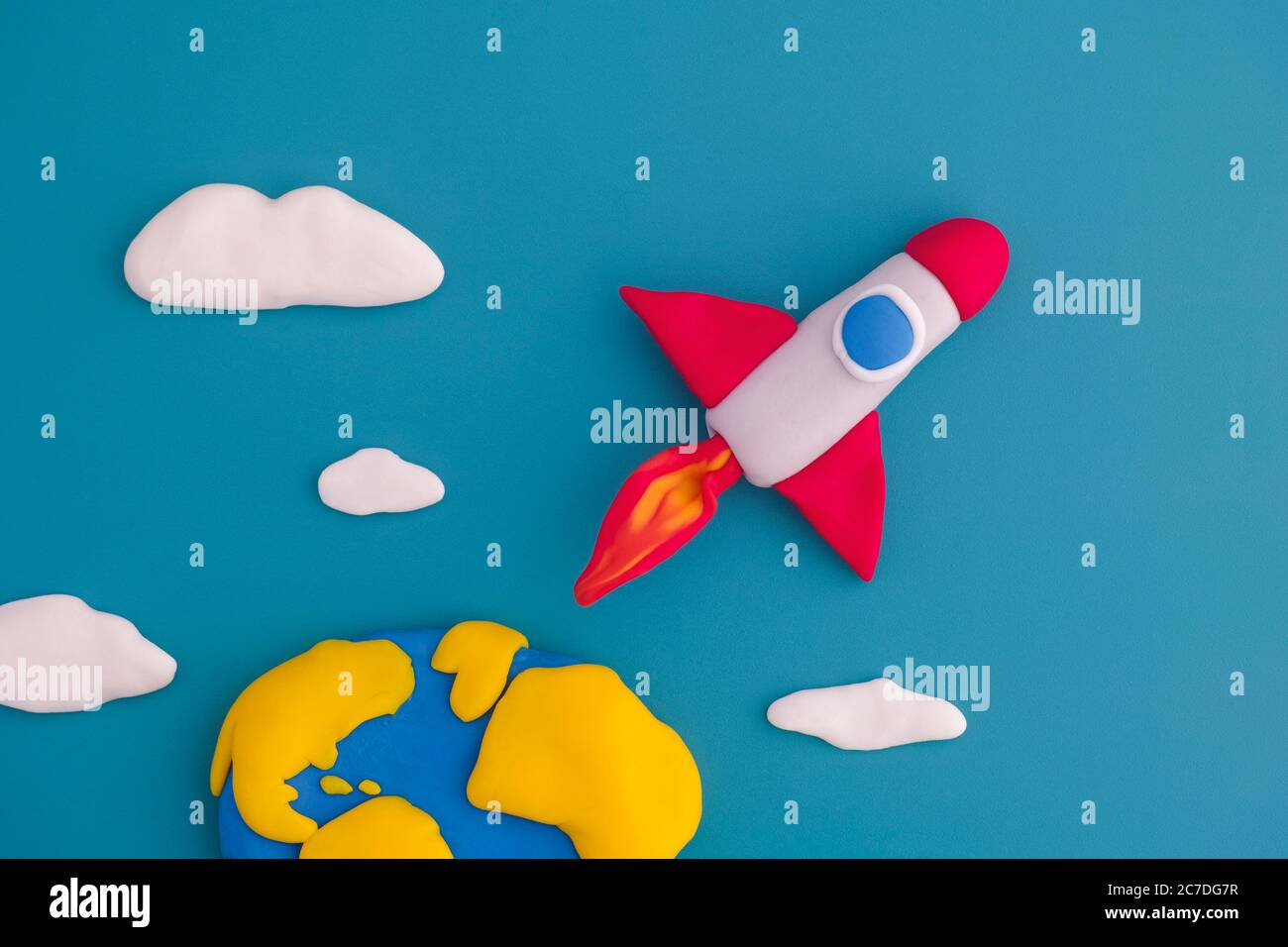 Space Rocket Blasting Off For New Ideas. The Earth and the space rocket ...