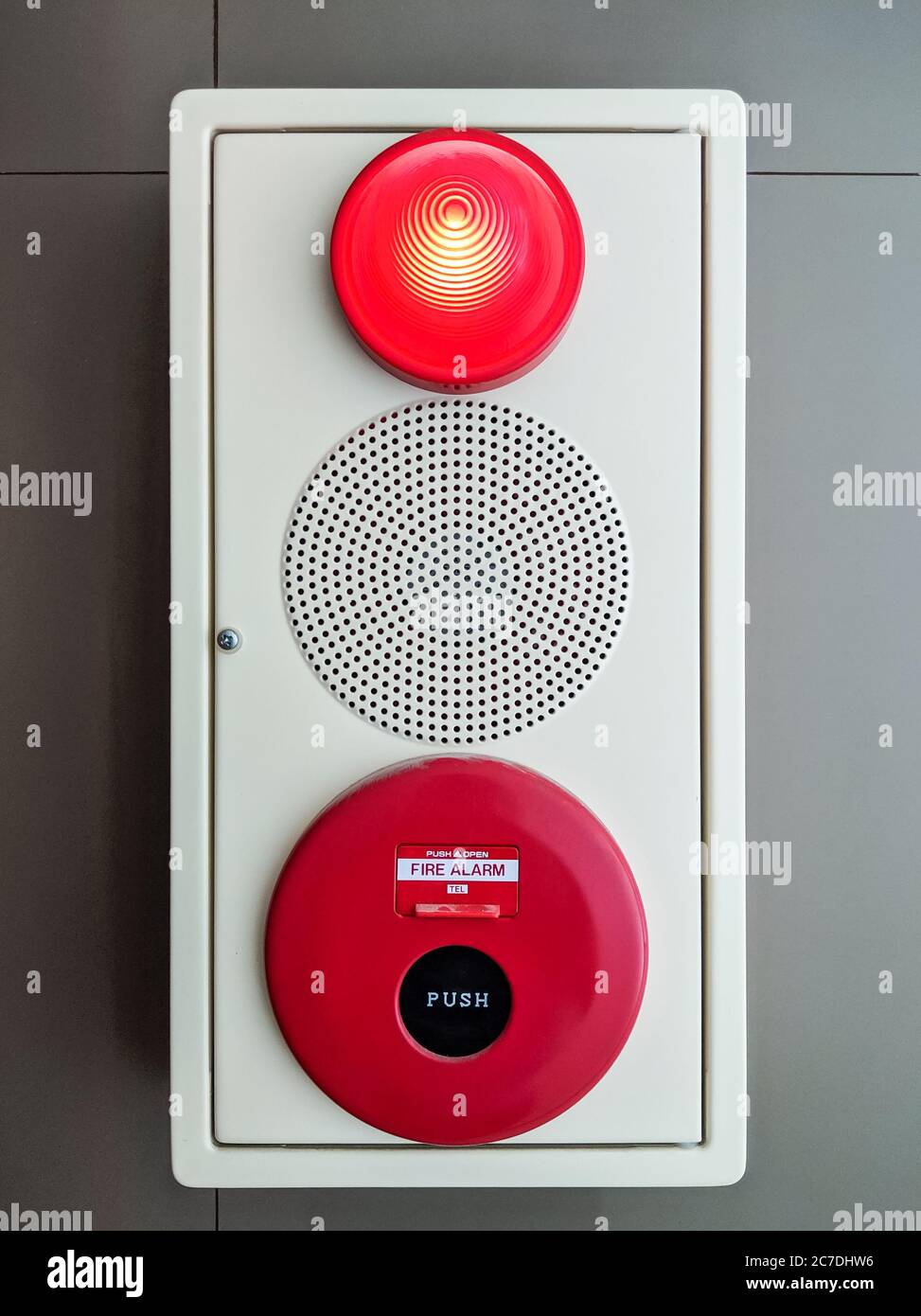 Fire alarm system (fire alarm bell, speaker, siren light) on the white ...