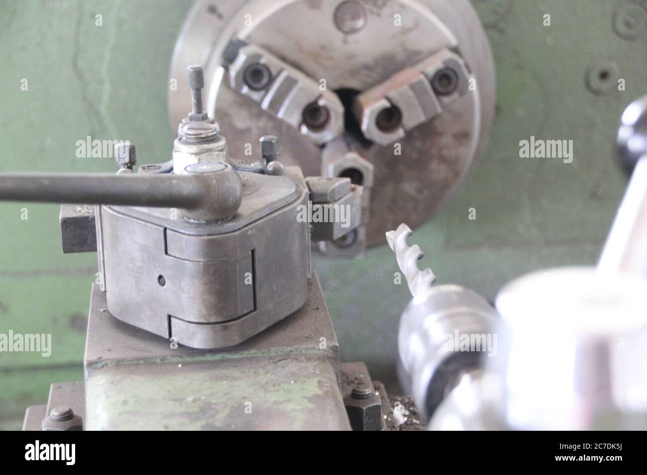 Metal working Lathe with drill tool Stock Photo - Alamy
