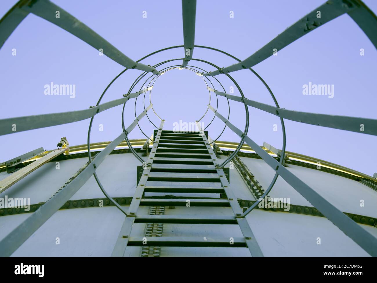 Point of view shot of metal stairs leading up a water tank Stock Photo ...
