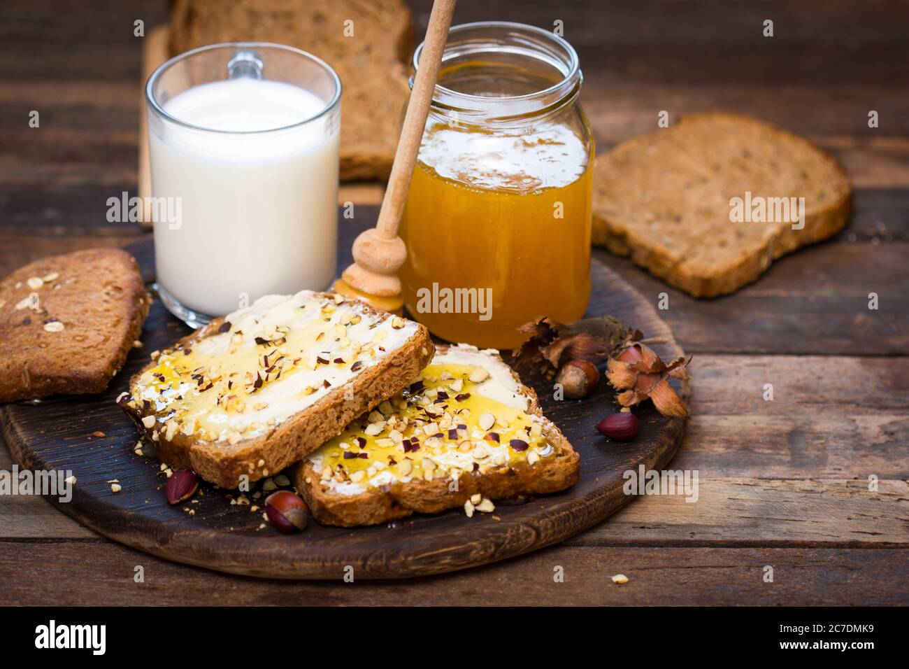 Healthy breakfast - bread, butter and honey Stock Photo - Alamy
