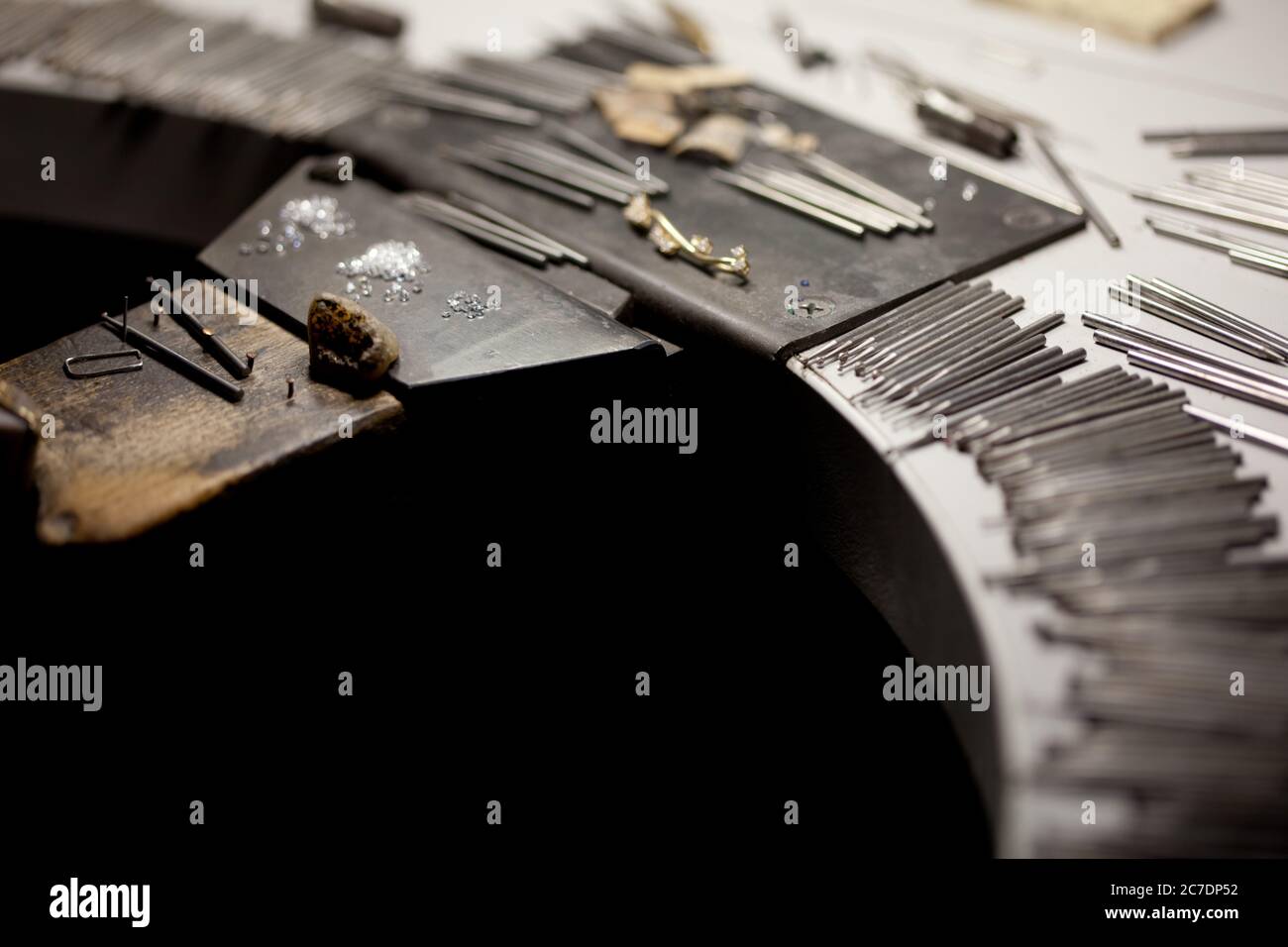 jeweller workshop with tools on table for precious metal jewellery work ...