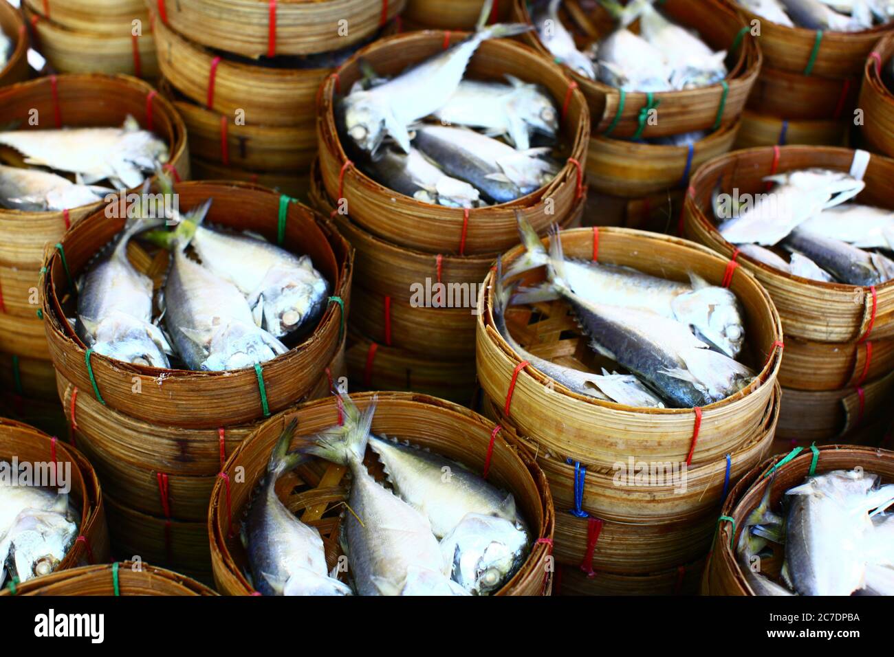 Horizontal high angle shot of fresh fish in wooden baskets in the ...