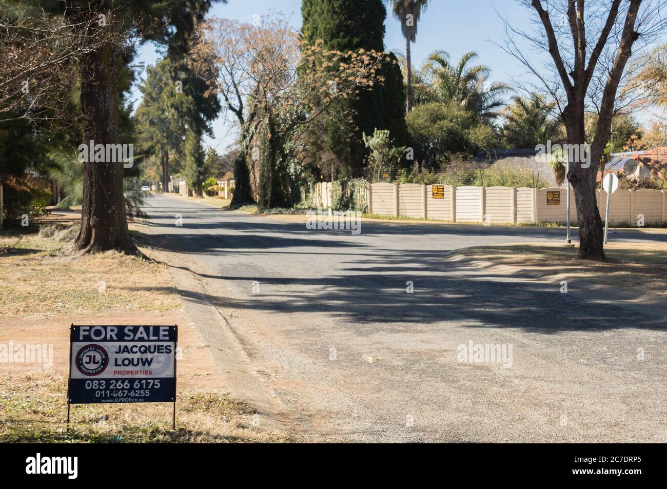 Alberton, South Africa - a for sale sign on the pavement in front of a ...