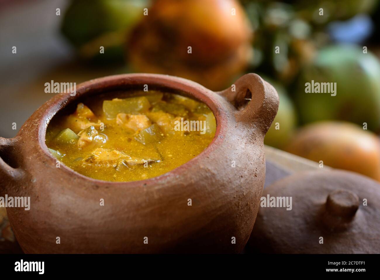 Fish broth served in a traditional clay pot. Typical Brazilian cuisine ...